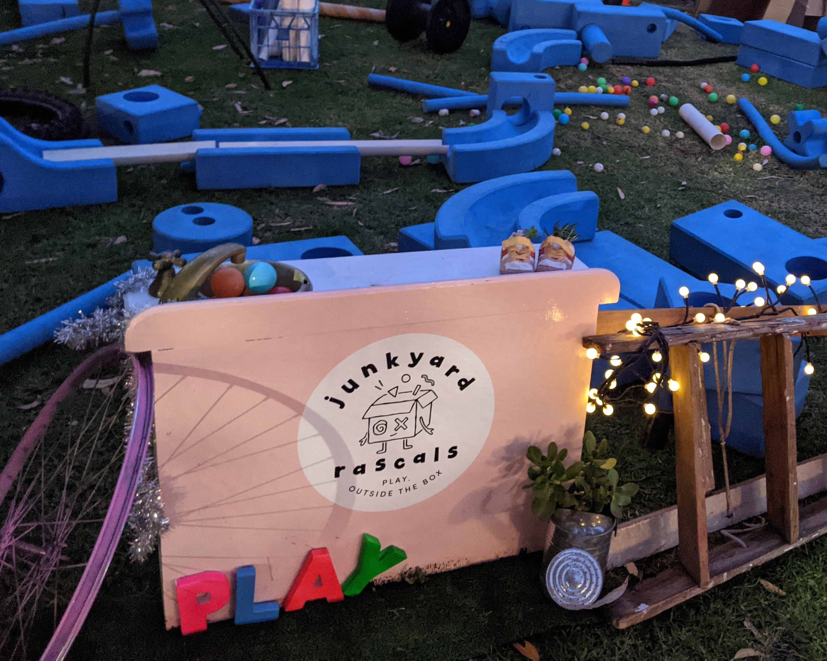 Junkyard Rascals wheel and sign – Inspiring Australia